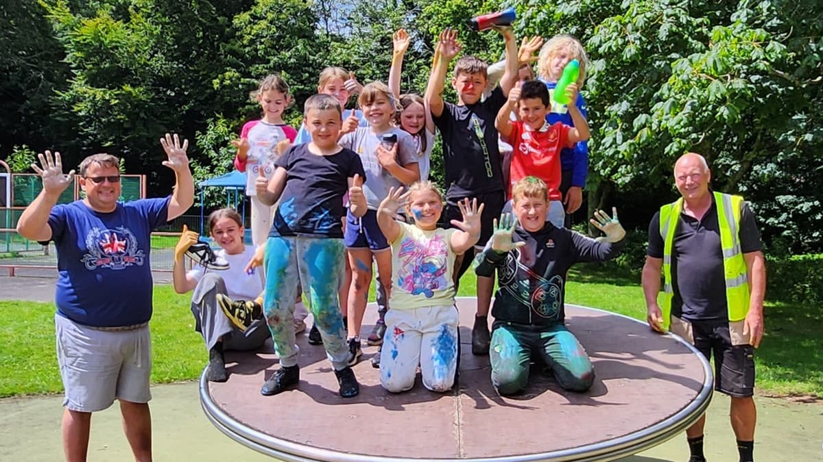 Primary school pupils help to paint play park in Mevagissey ...