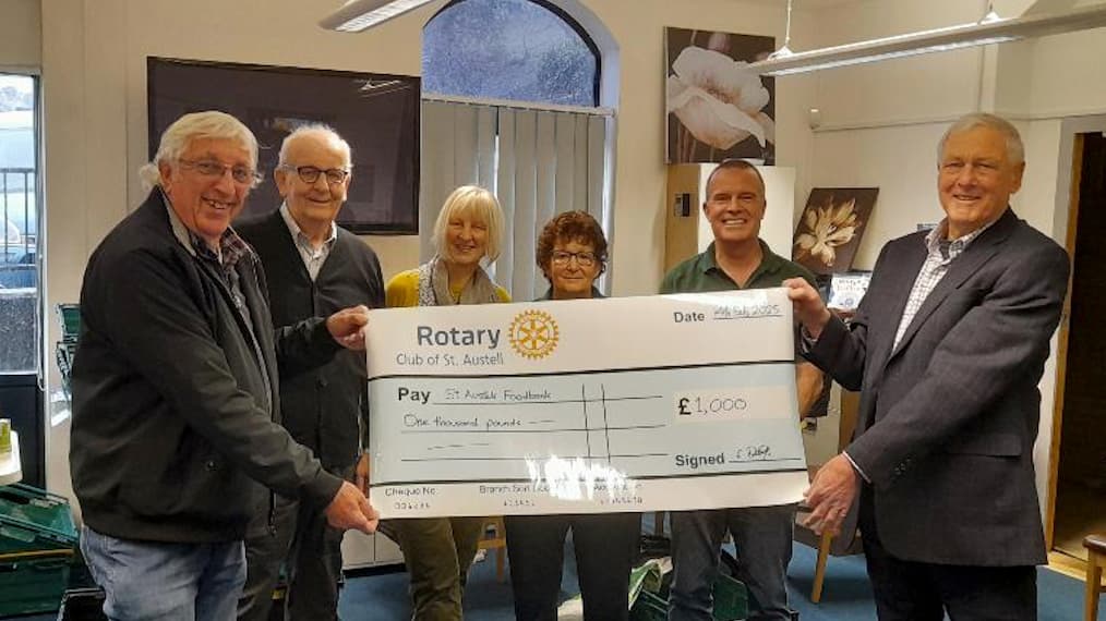 Rotary club presents giant cheque to St Austell Foodbank ...